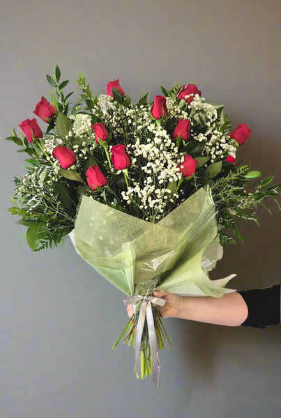 Dozen red roses wrapped with no vase – Sunstrum's Florist